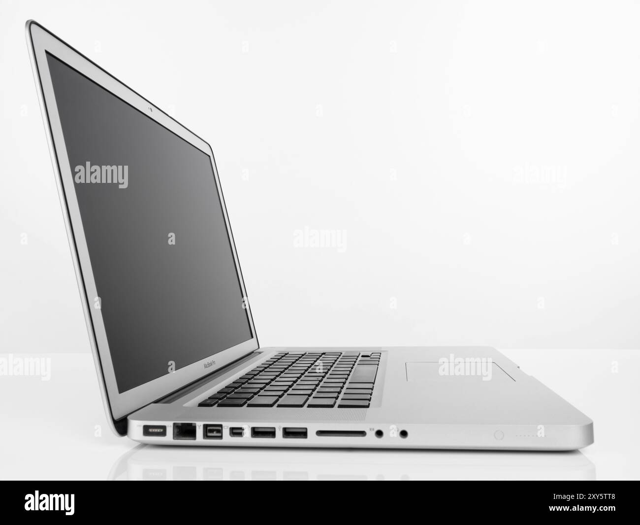 Apple Macbook Pro laptop computer side view isolated on white ...
