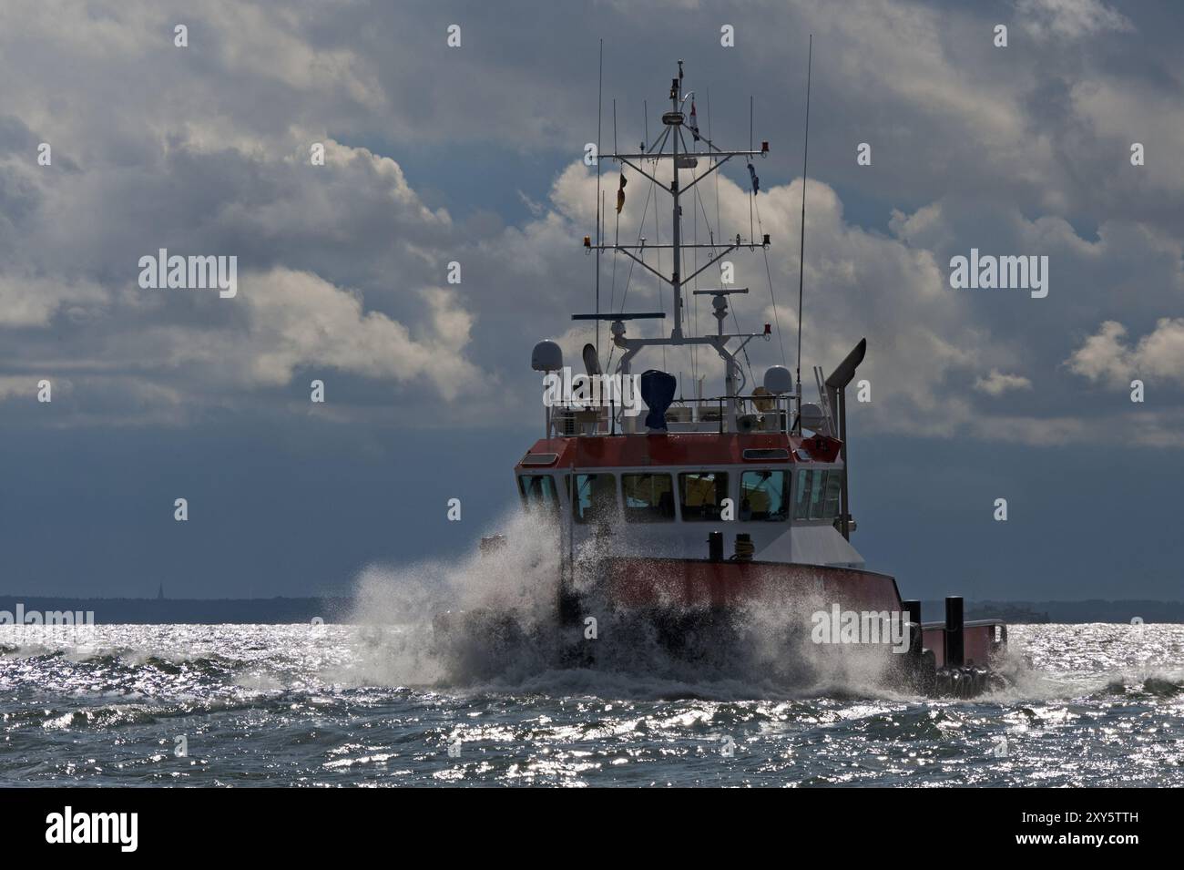 Ocean-going tugs on the Baltic Sea on a counter-course Stock Photo - Alamy