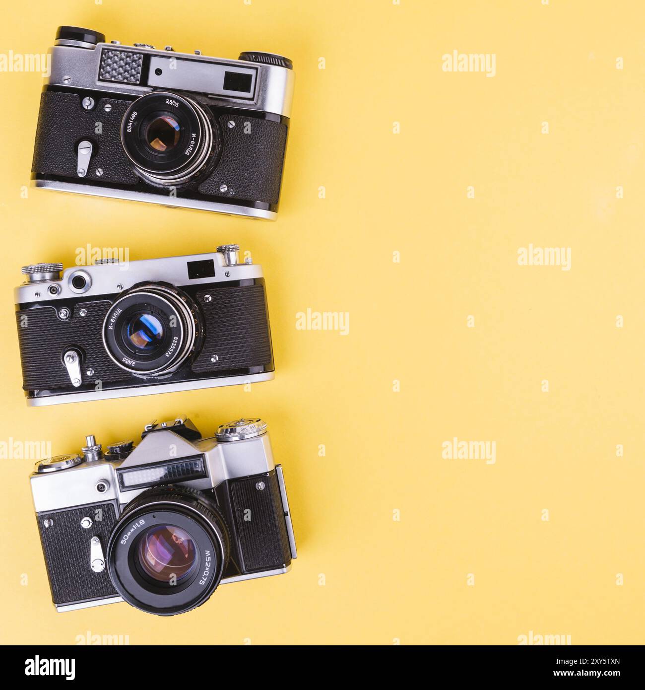 Camera line yellow background Stock Photo - Alamy