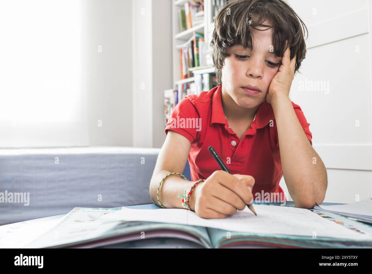 Child drawing paper table Stock Photo - Alamy