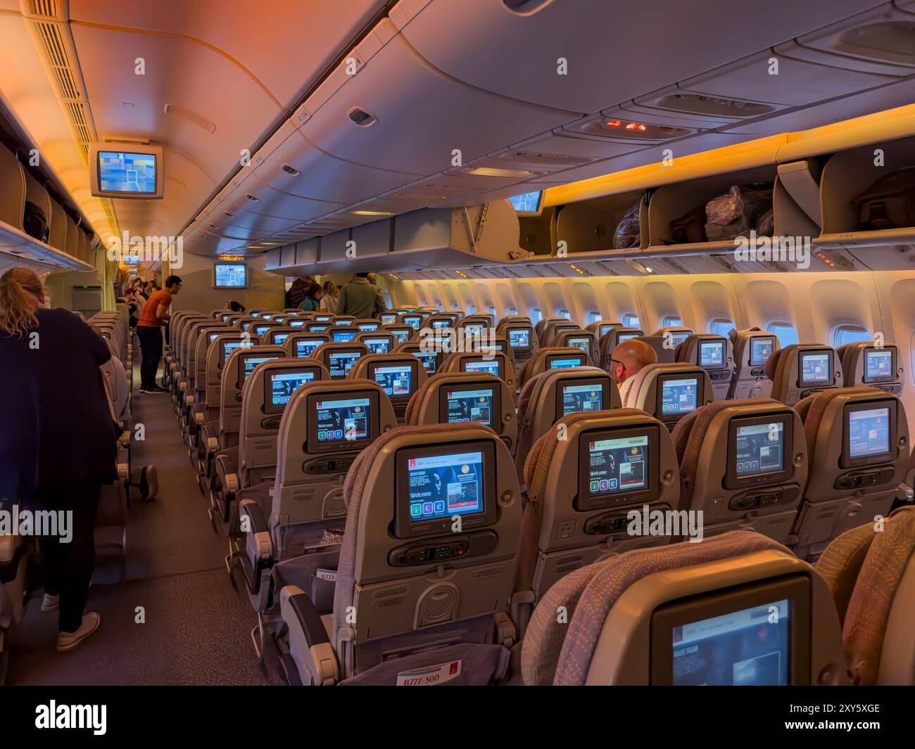 Interior of plane as passengers start to board an Emirates evening ...