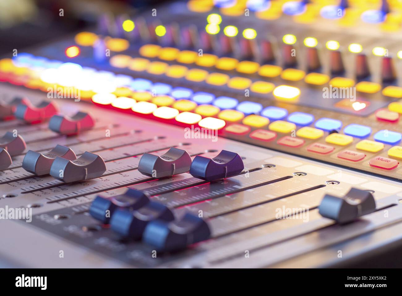 Professional music production in a sound recording studio, mixer desk ...
