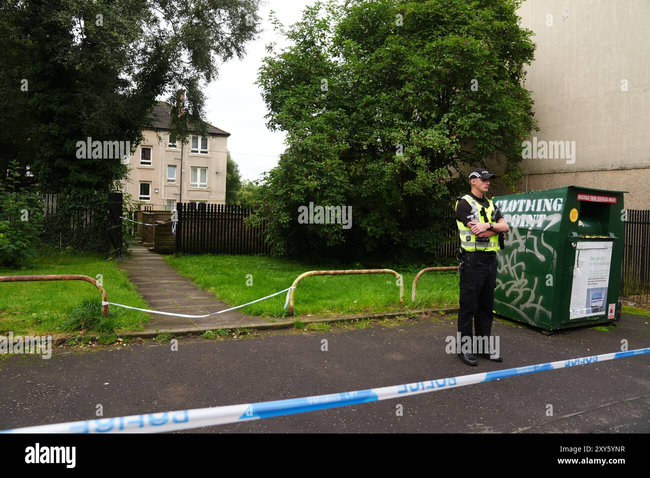 Police officers at the scene in Elmvale Street in the Springburn area ...