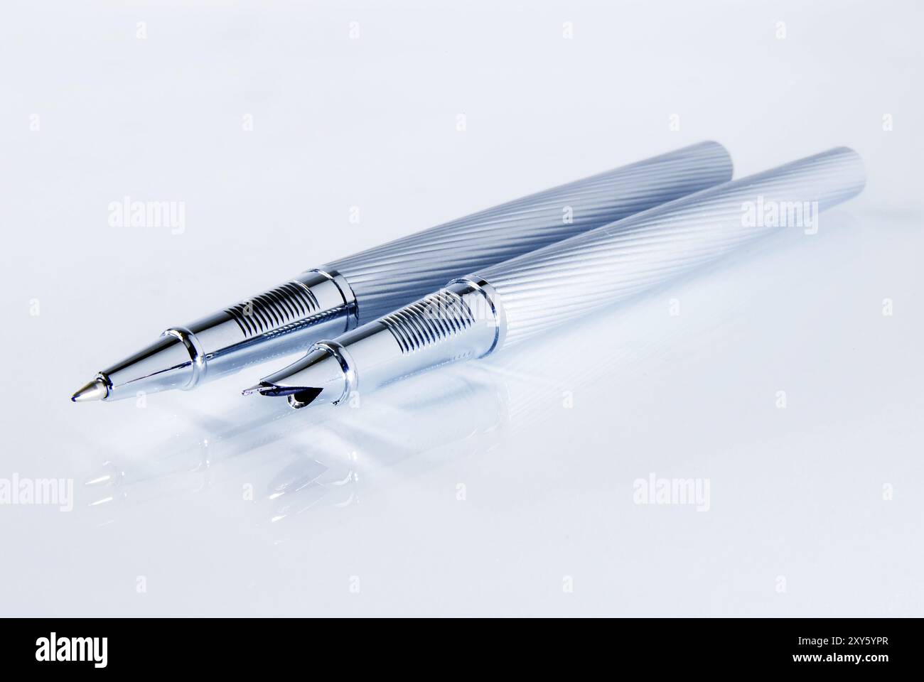Fountain pen and biros Stock Photo - Alamy