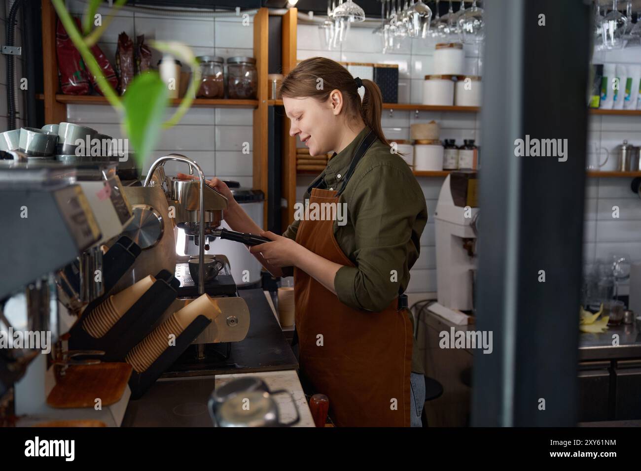 Cropped shot woman barista hi-res stock photography and images - Alamy