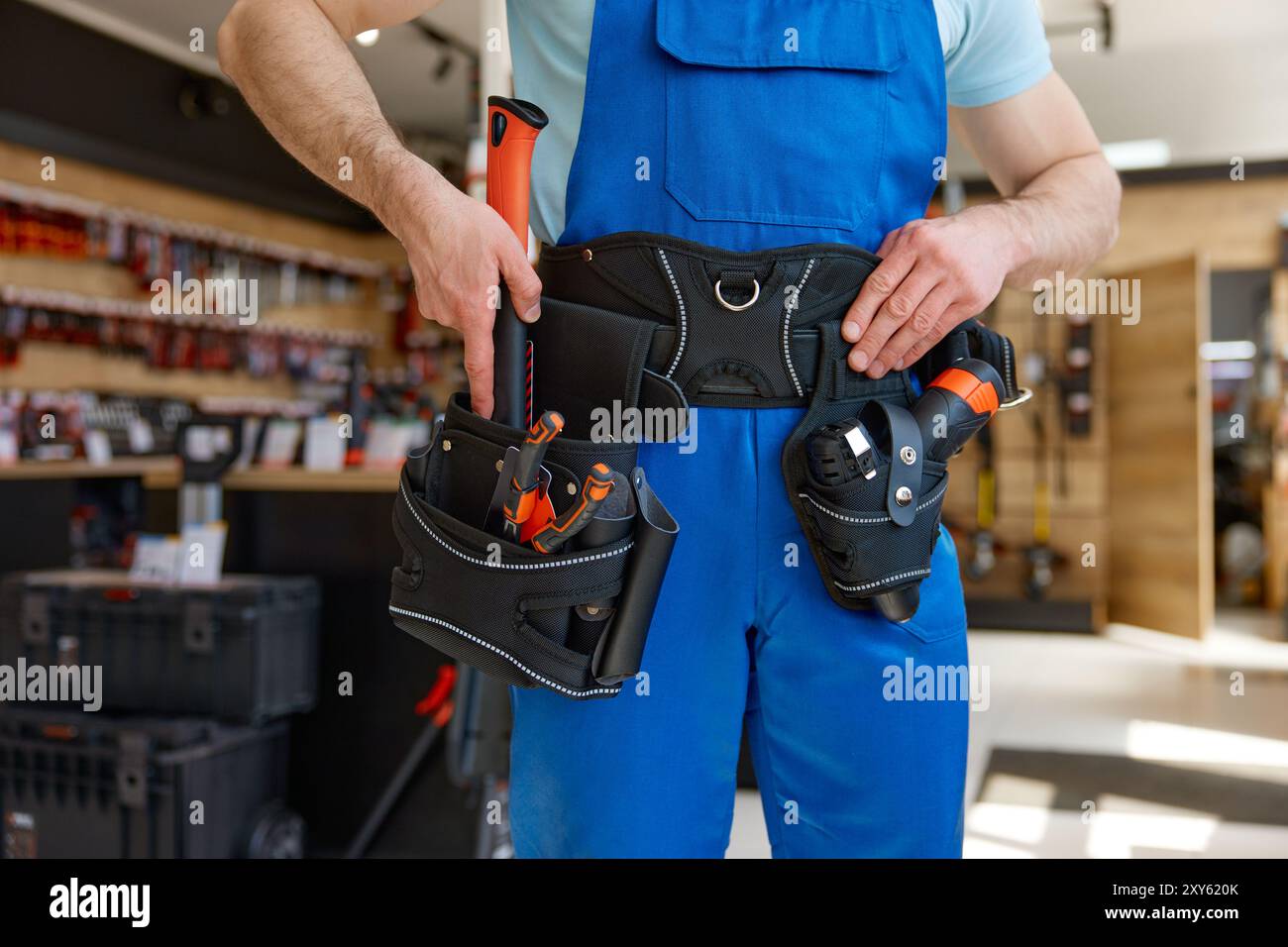 Well-equipped mechanic worker wearing uniform and tools belt Stock ...