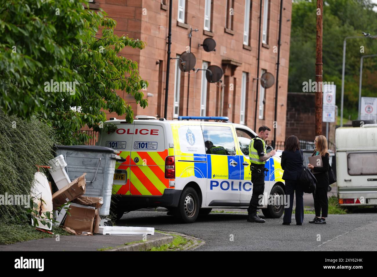 Police officers at the scene in Elmvale Street in the Springburn area ...
