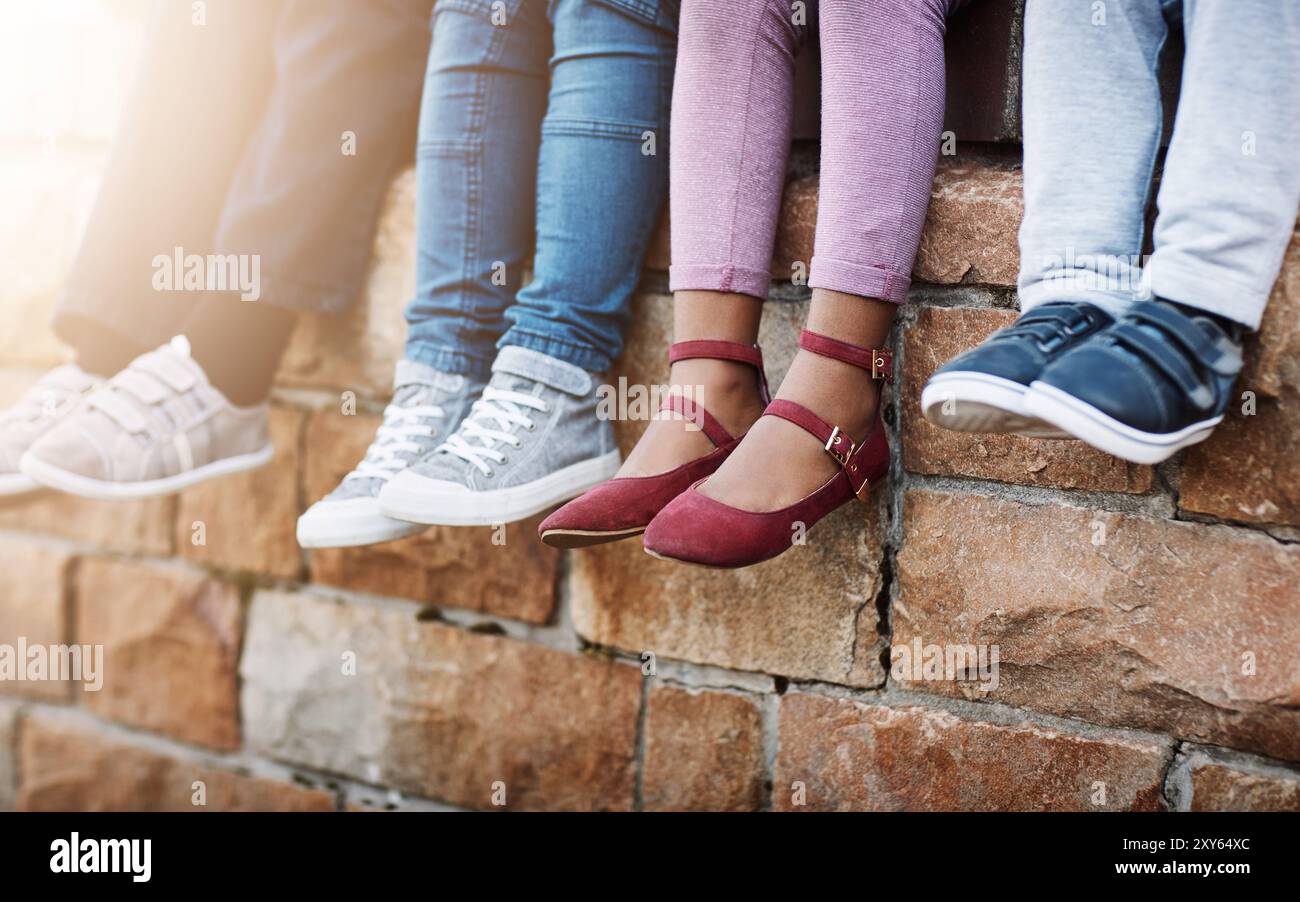 Children, legs and break at outdoor school, students and class for ...