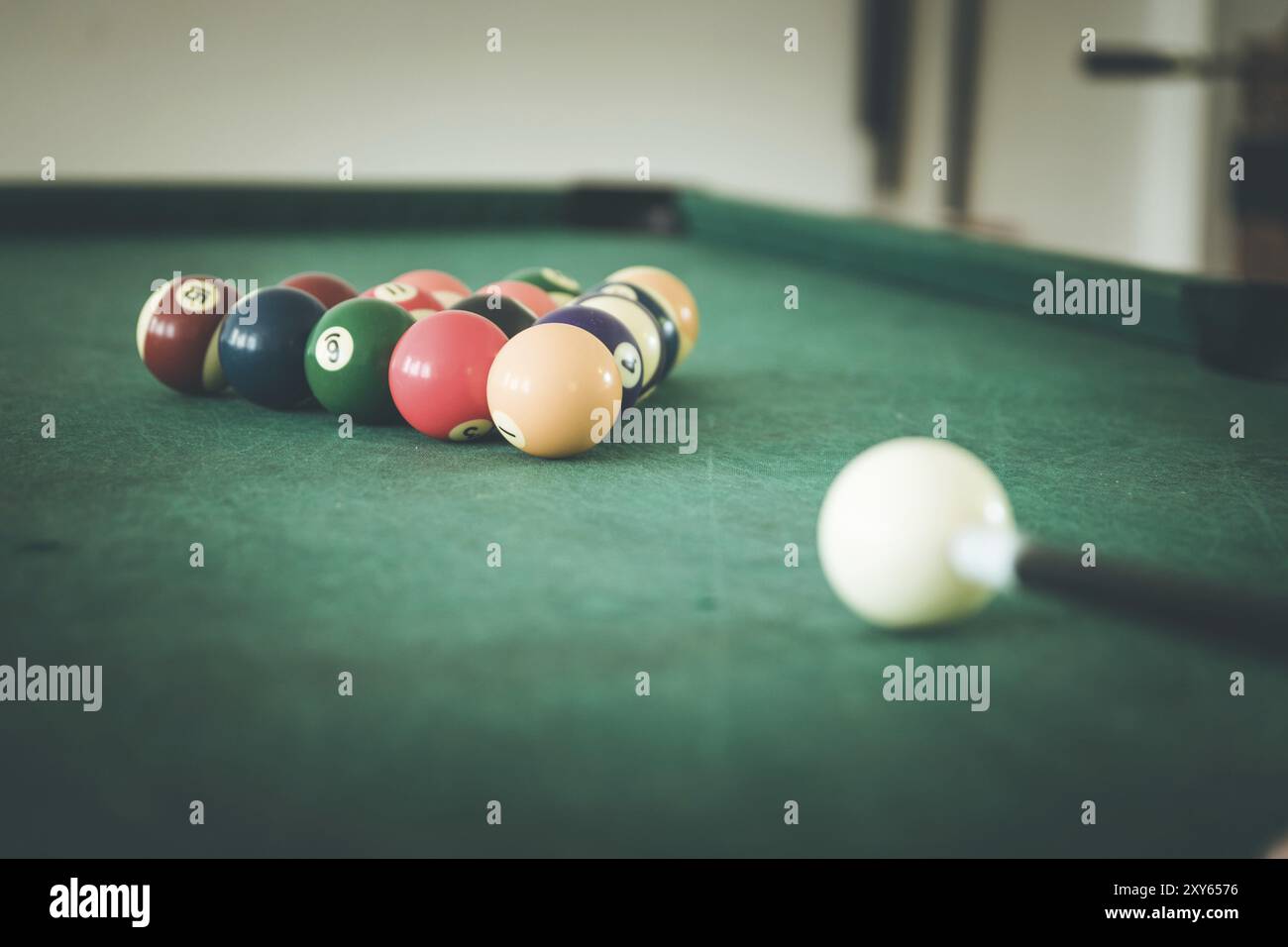 Billard balls and table in a bar Stock Photo - Alamy