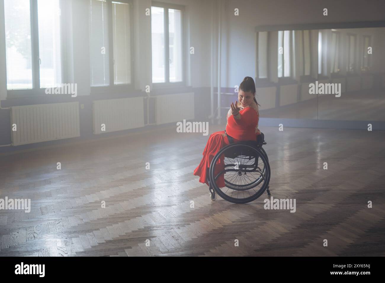 Wheelchair dancing competition training, an active dedicated young ...