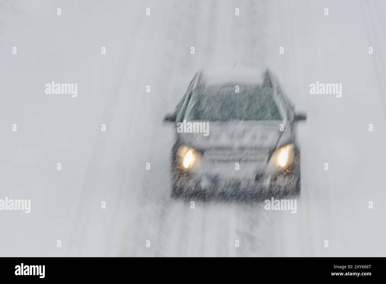 Snow blowing over road hi-res stock photography and images - Alamy