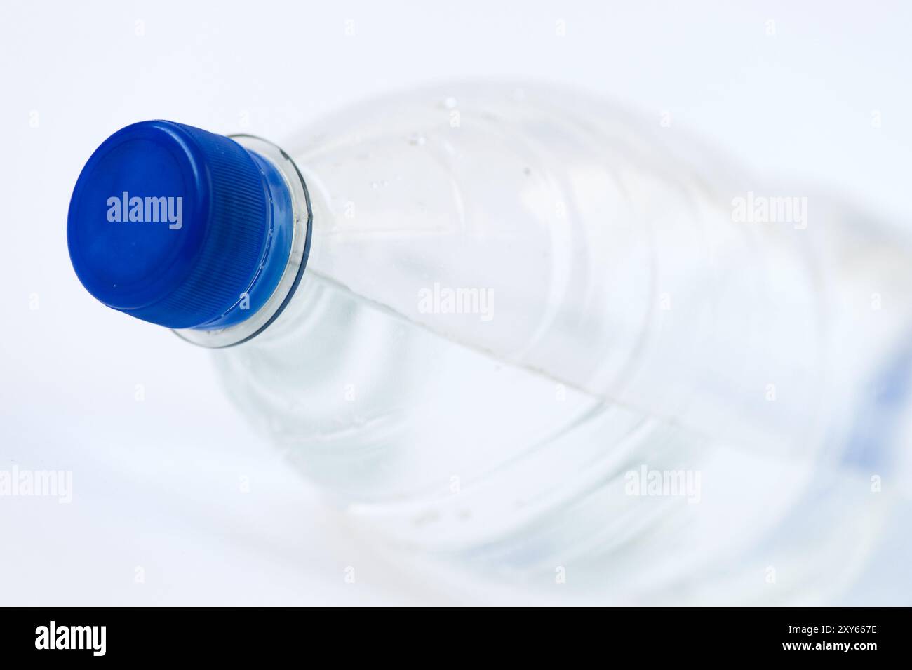 Horizontal water bottle half full Stock Photo - Alamy