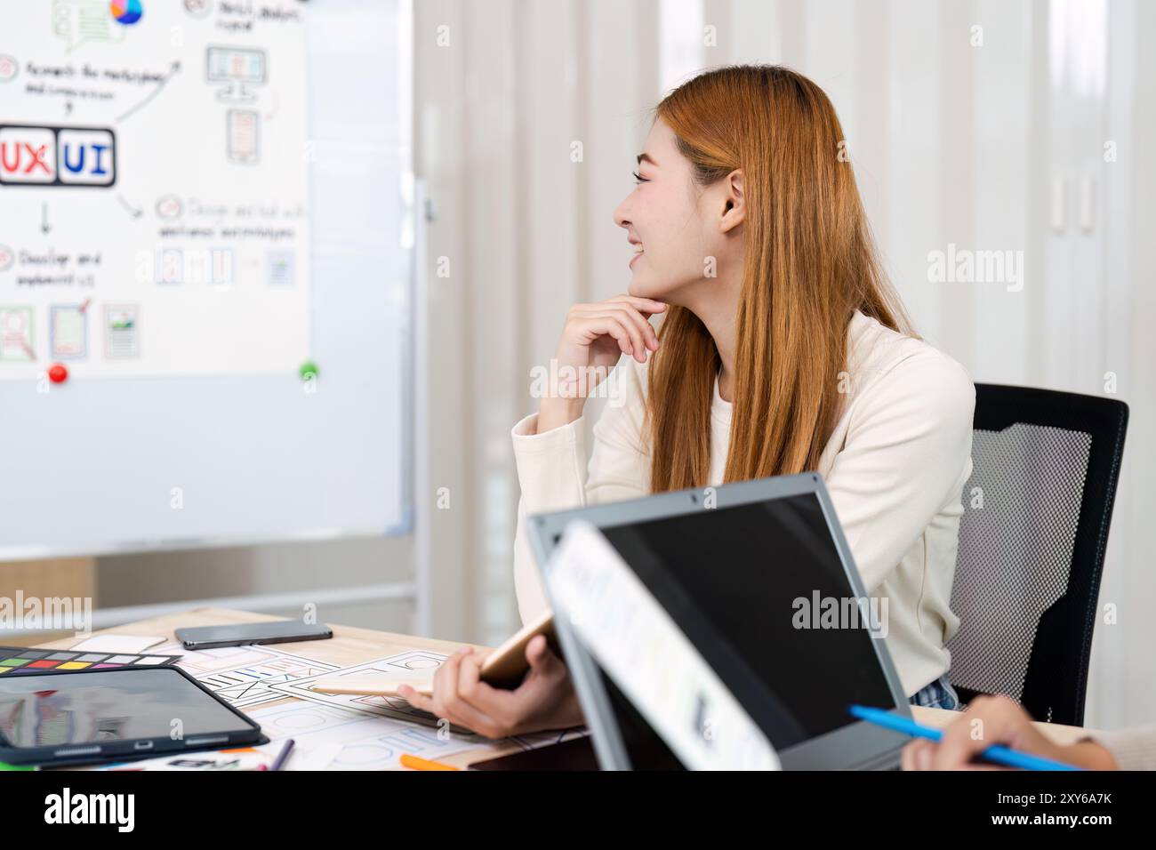 Professional Team Collaborating On Ux Ui Design Project In Modern