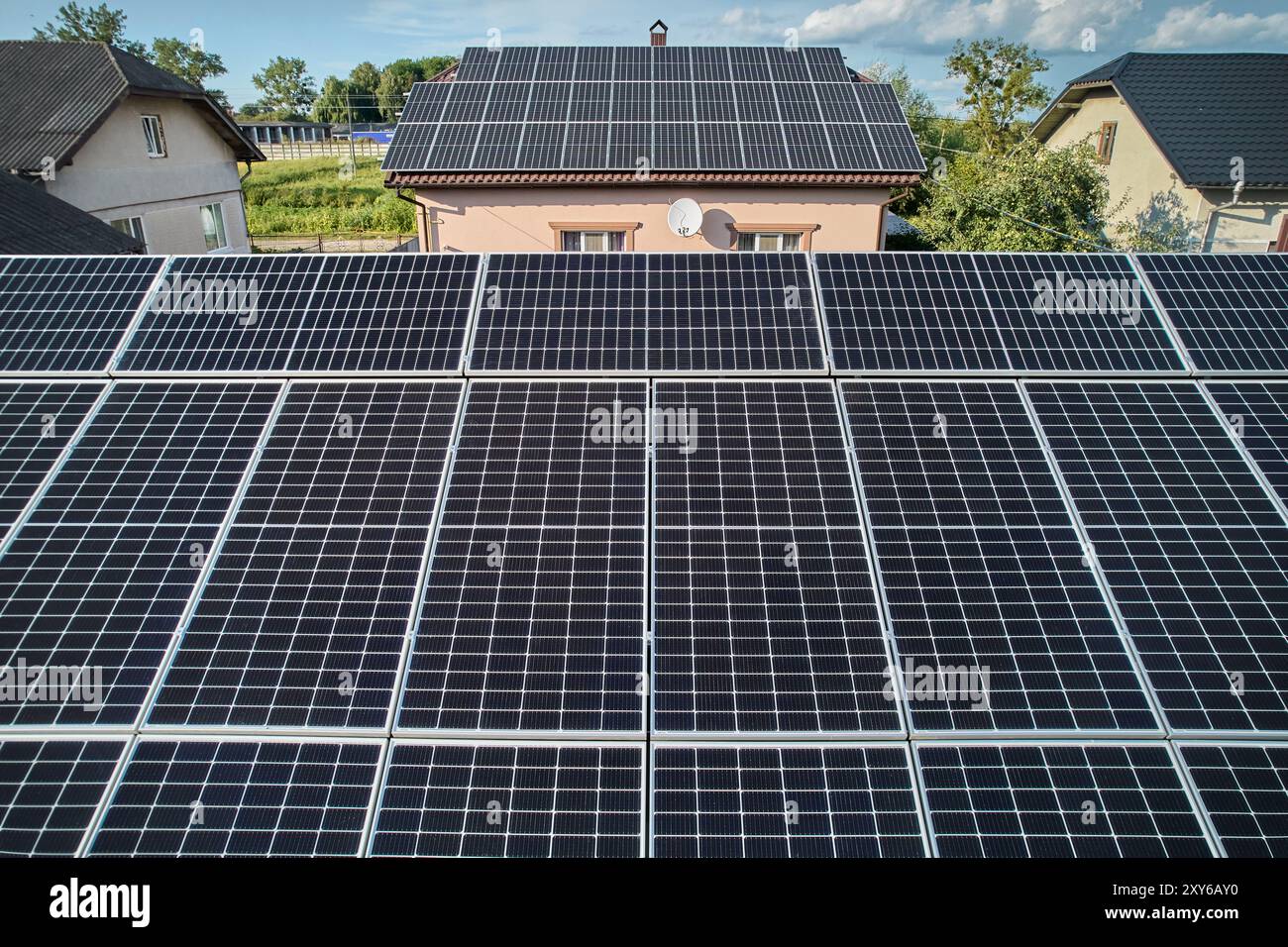 Aerial top view of new modern house cottage with solar photovoltaic ...