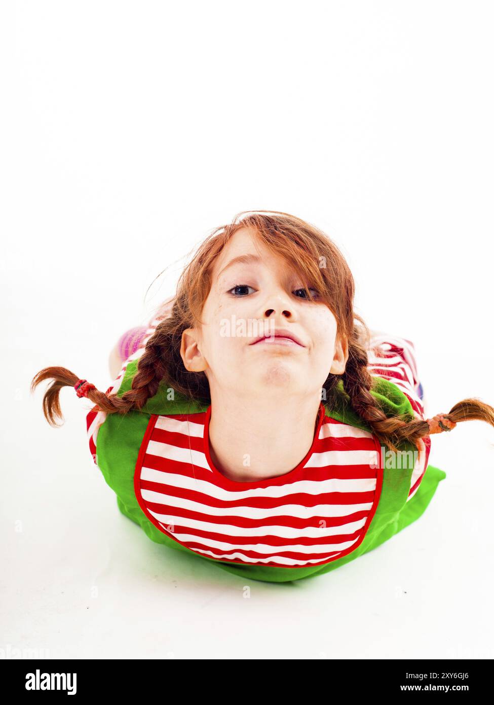 Little girl dressed as Pippi Longstocking with white background Stock ...