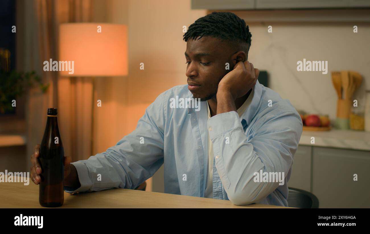 Sad man sit table alone hi-res stock photography and images - Alamy