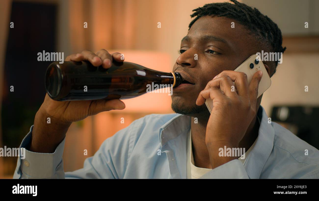 Frustrated man drinking beer hi-res stock photography and images - Alamy