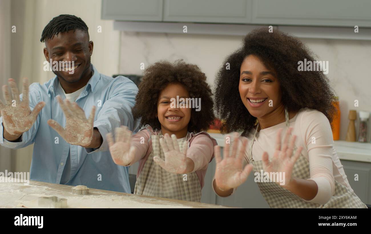 African American happy family ethnic parents with child girl kid ...