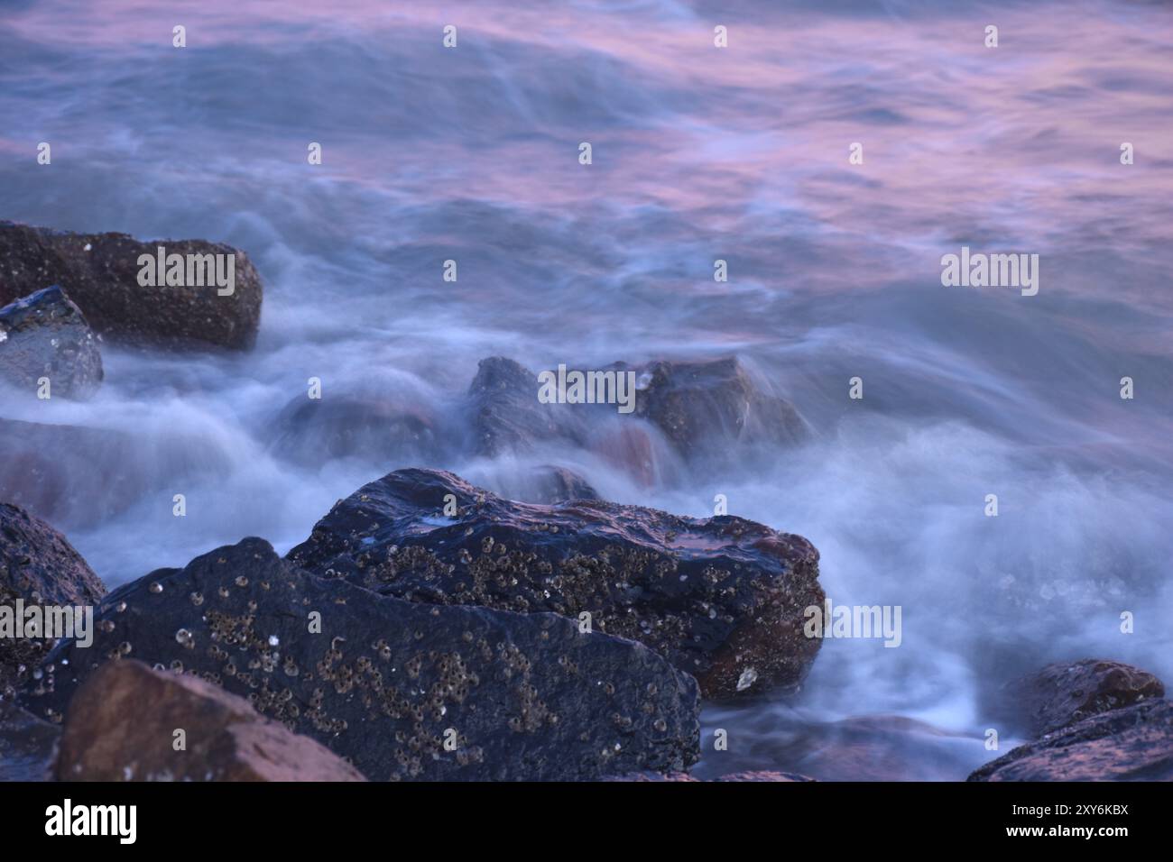landscape of sea on sunset at tilted pole beach in Thailand Stock Photo ...