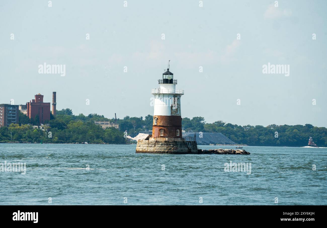 The historic Robbins Reef lighthouse is in New York Harbor near the ...