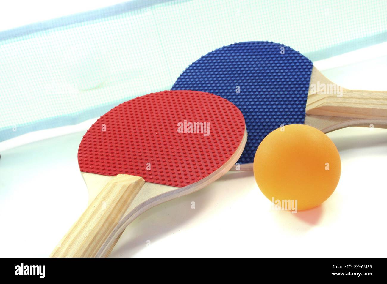 Two table tennis bats and ball on a white background Stock Photo - Alamy