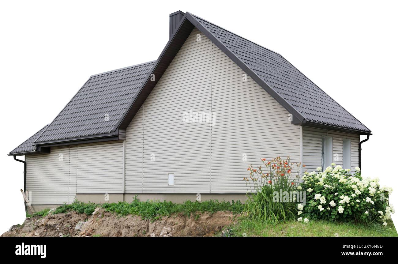 A modern shed with plastic walls is built on the edge of a ravine ...