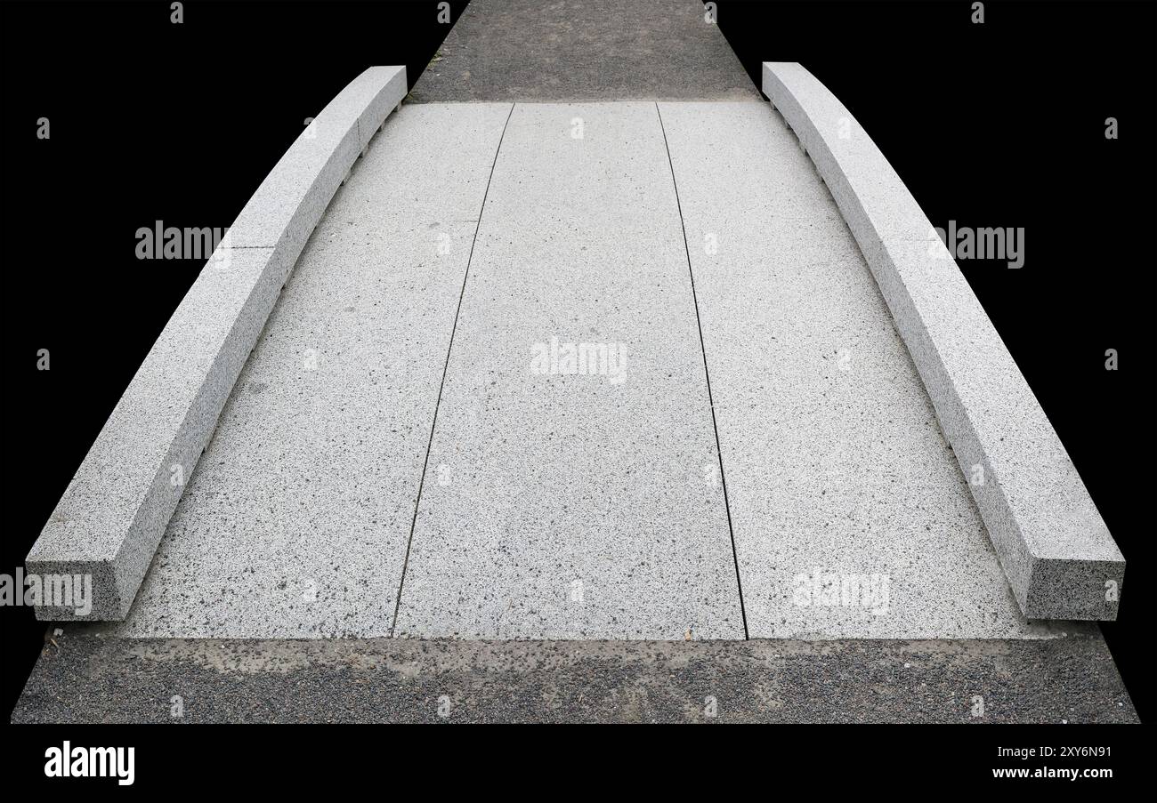 Pedestrian bridge made of white granite in a Japanese garden. Isolated ...