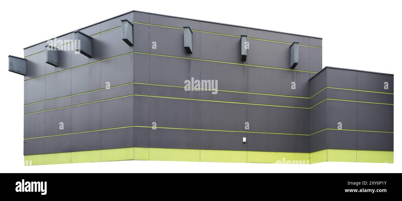 The walls of the modern building are covered with grey metal panels ...