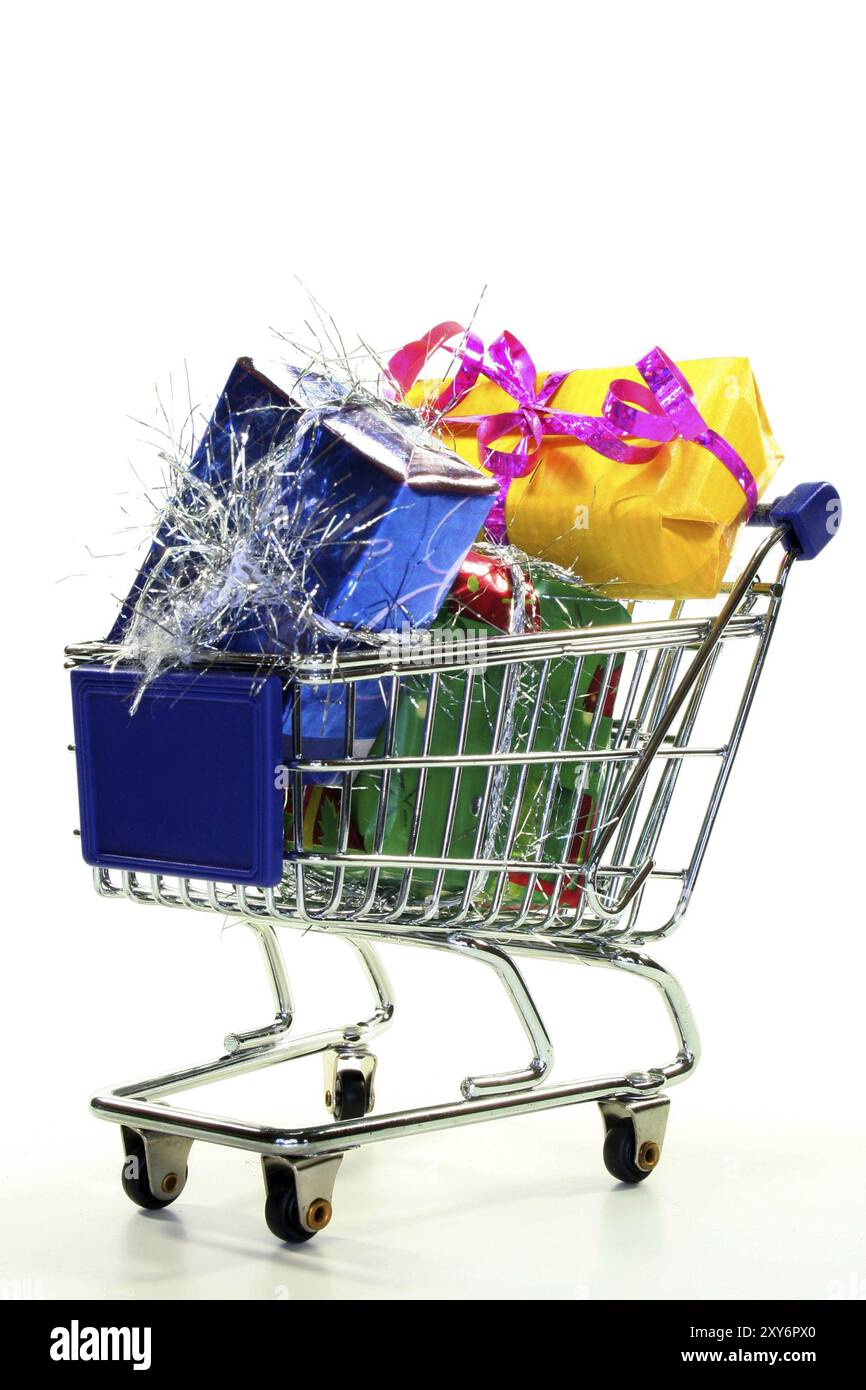 Shopping trolley loaded with presents Stock Photo - Alamy
