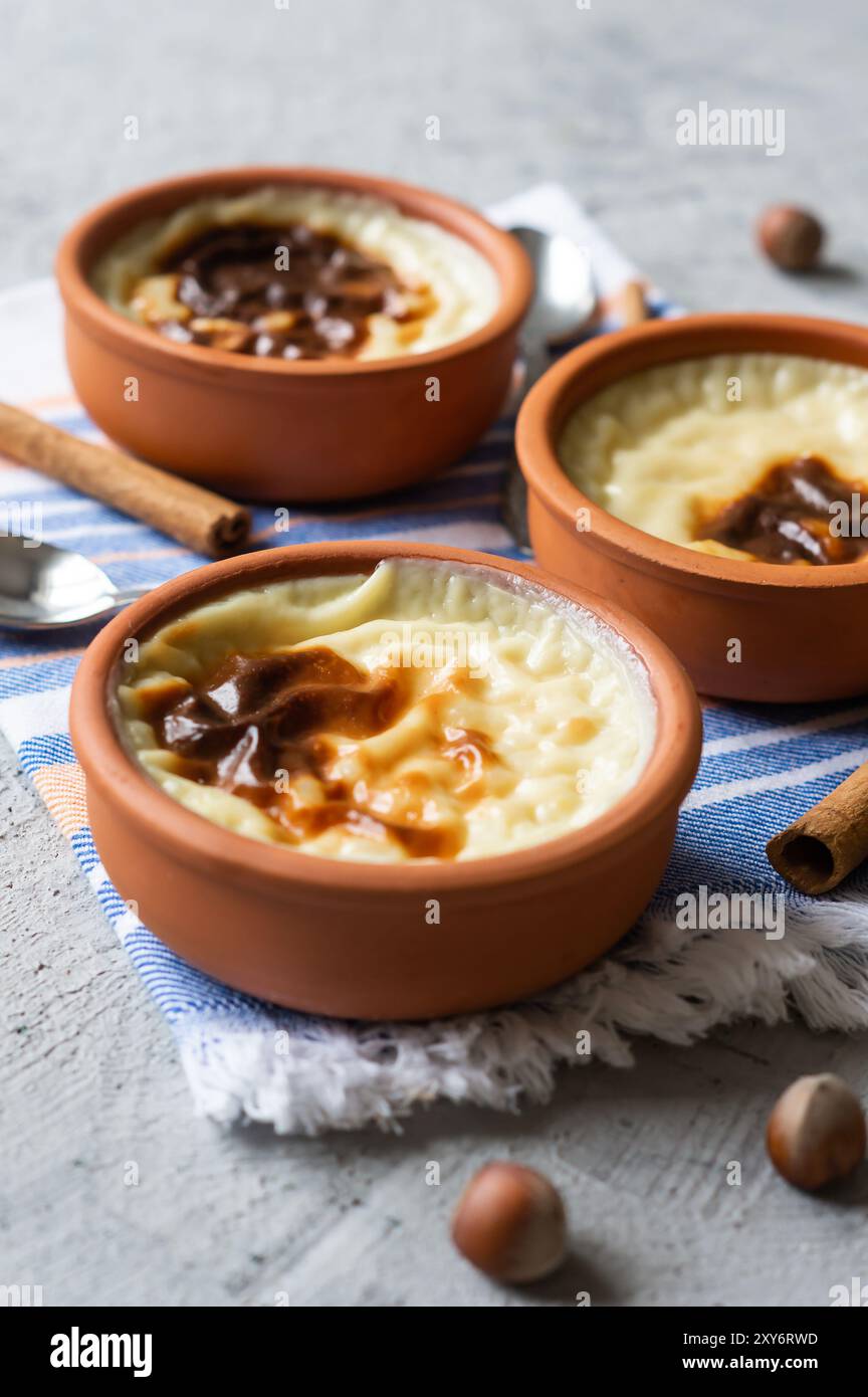 Baked rice pudding turkish milky dessert sutlac in casserole with ...