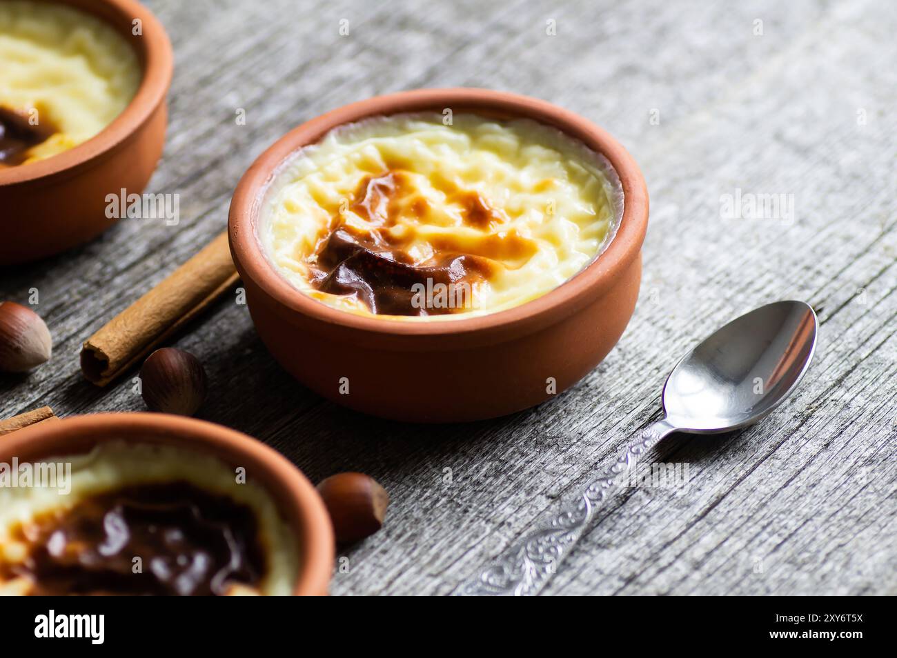 Baked rice pudding turkish milky dessert sutlac in casserole with ...