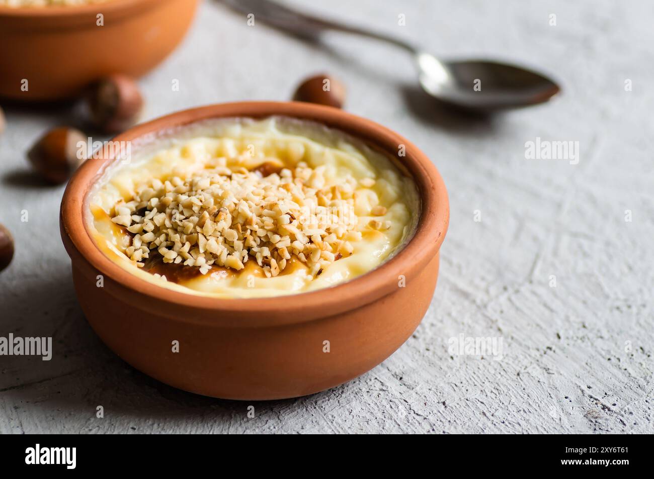 Baked rice pudding turkish milky dessert sutlac in casserole with ...