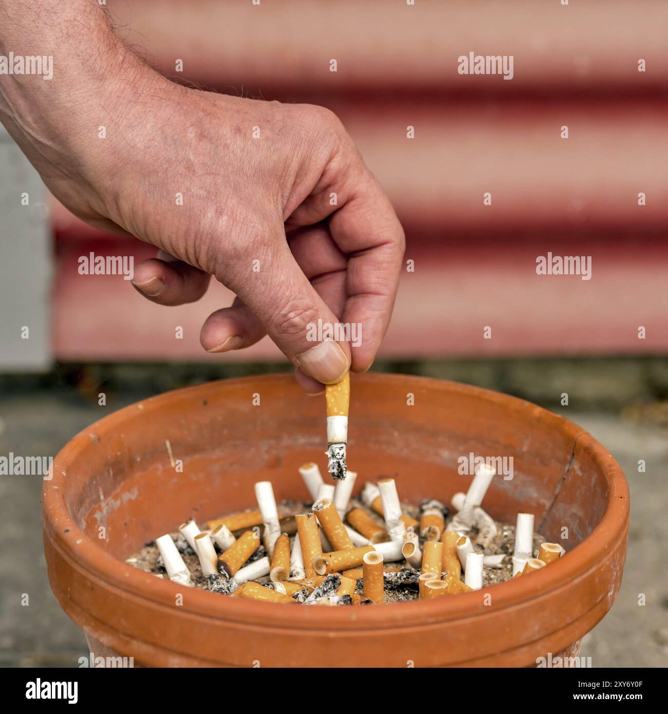 Stubbed out cigarette hi-res stock photography and images - Alamy