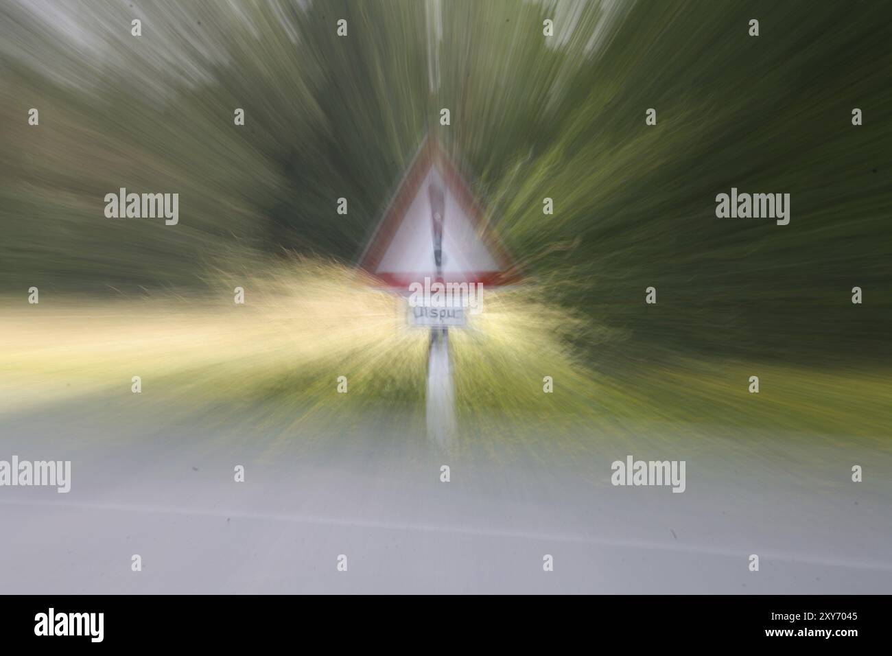 Warning sign (zoomed) at the scene of an accident Stock Photo - Alamy