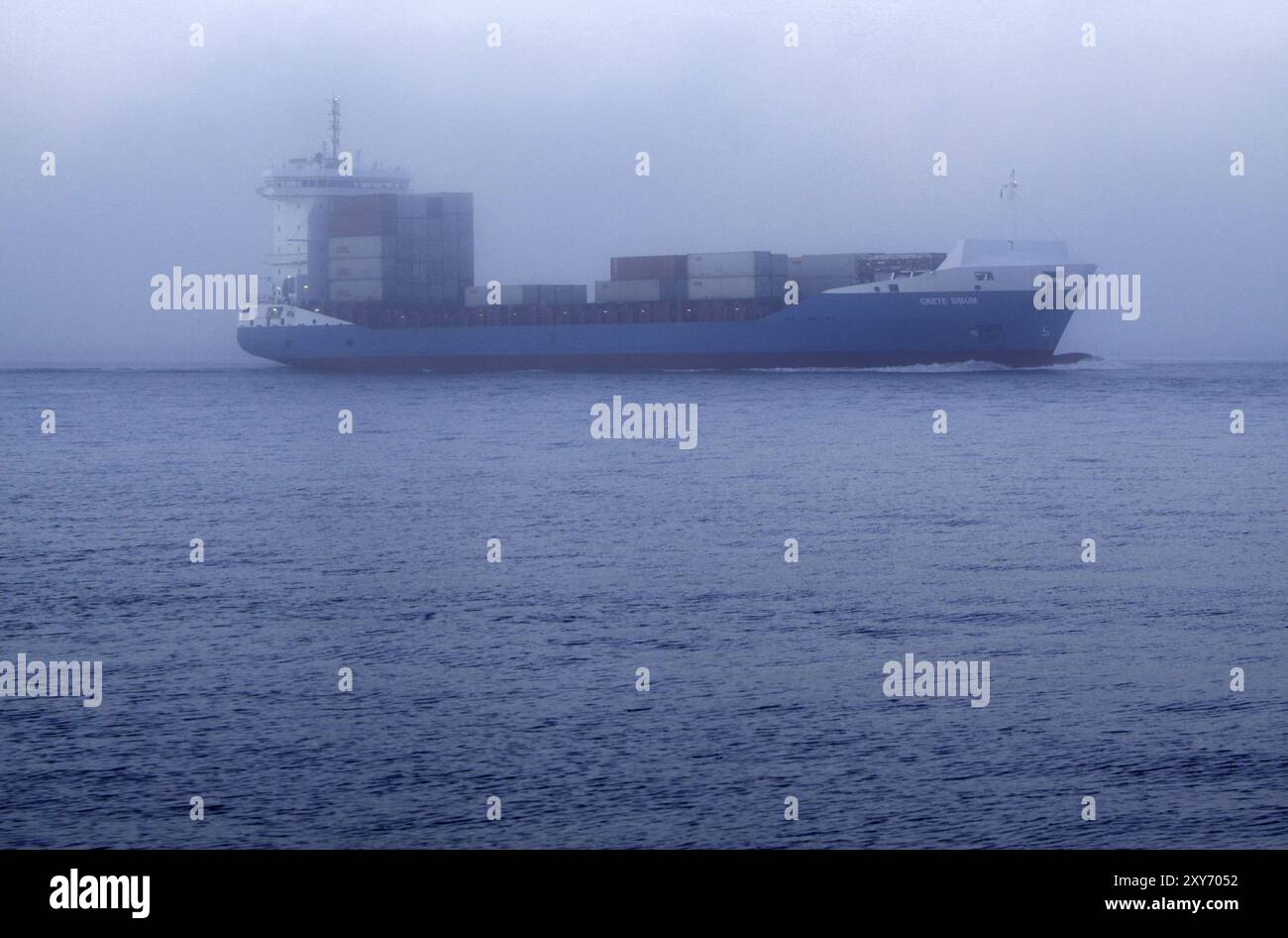 Container ship off Cuxhaven in the fog Stock Photo - Alamy
