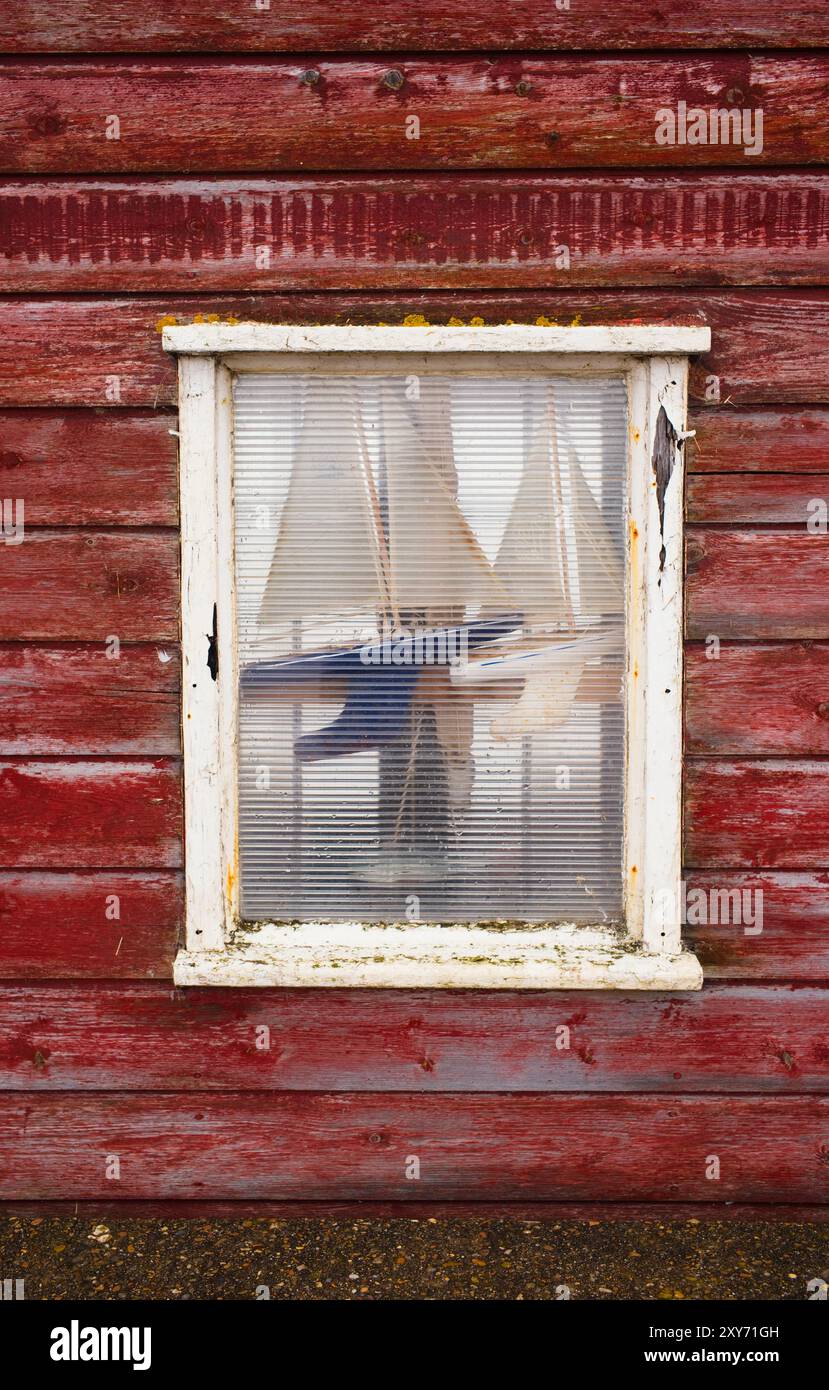 Pond yachts in a window of a beach hut at Southwold, Suffolk Stock ...