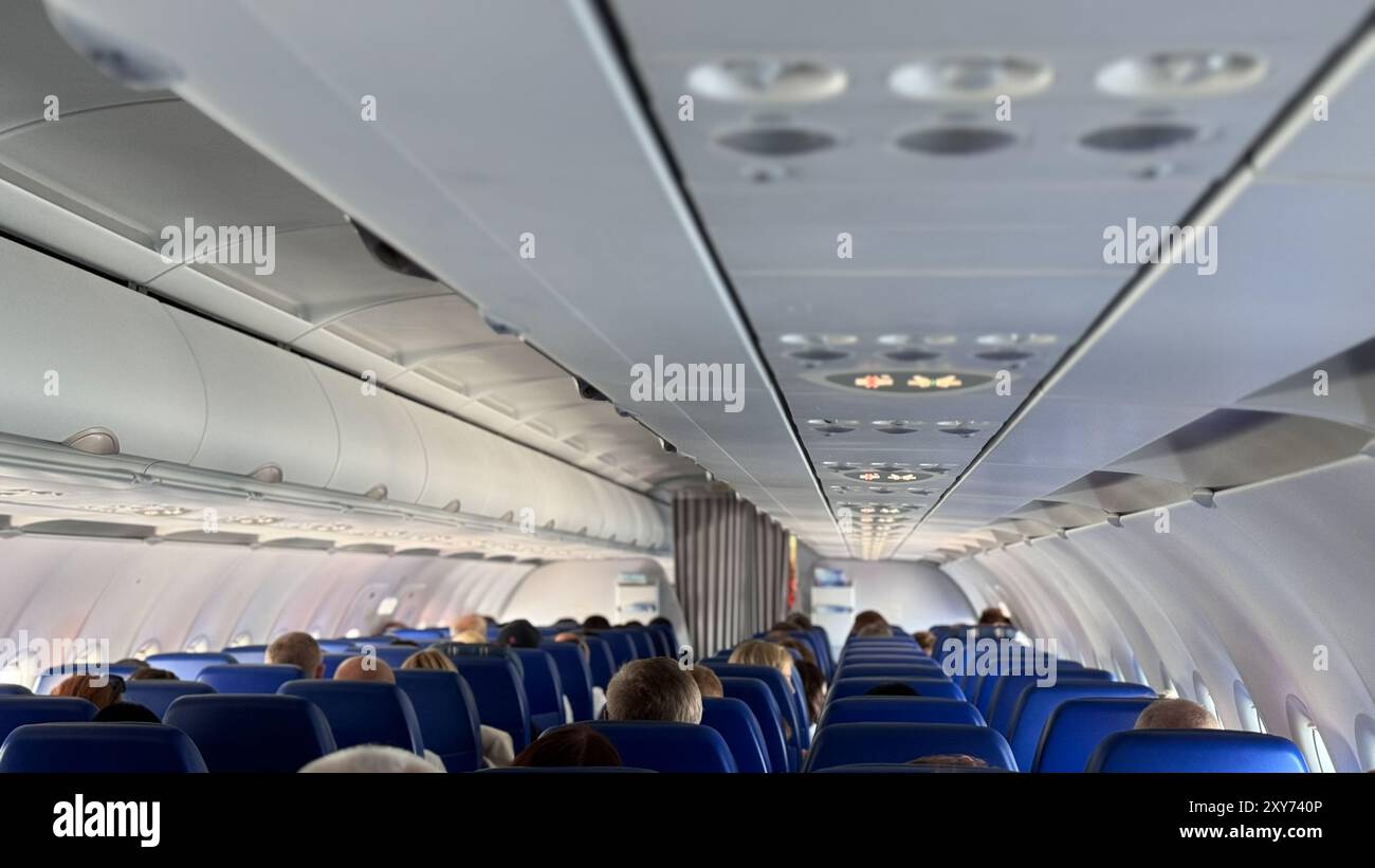 passengers inside the plane preparing for takeoff Stock Photo - Alamy
