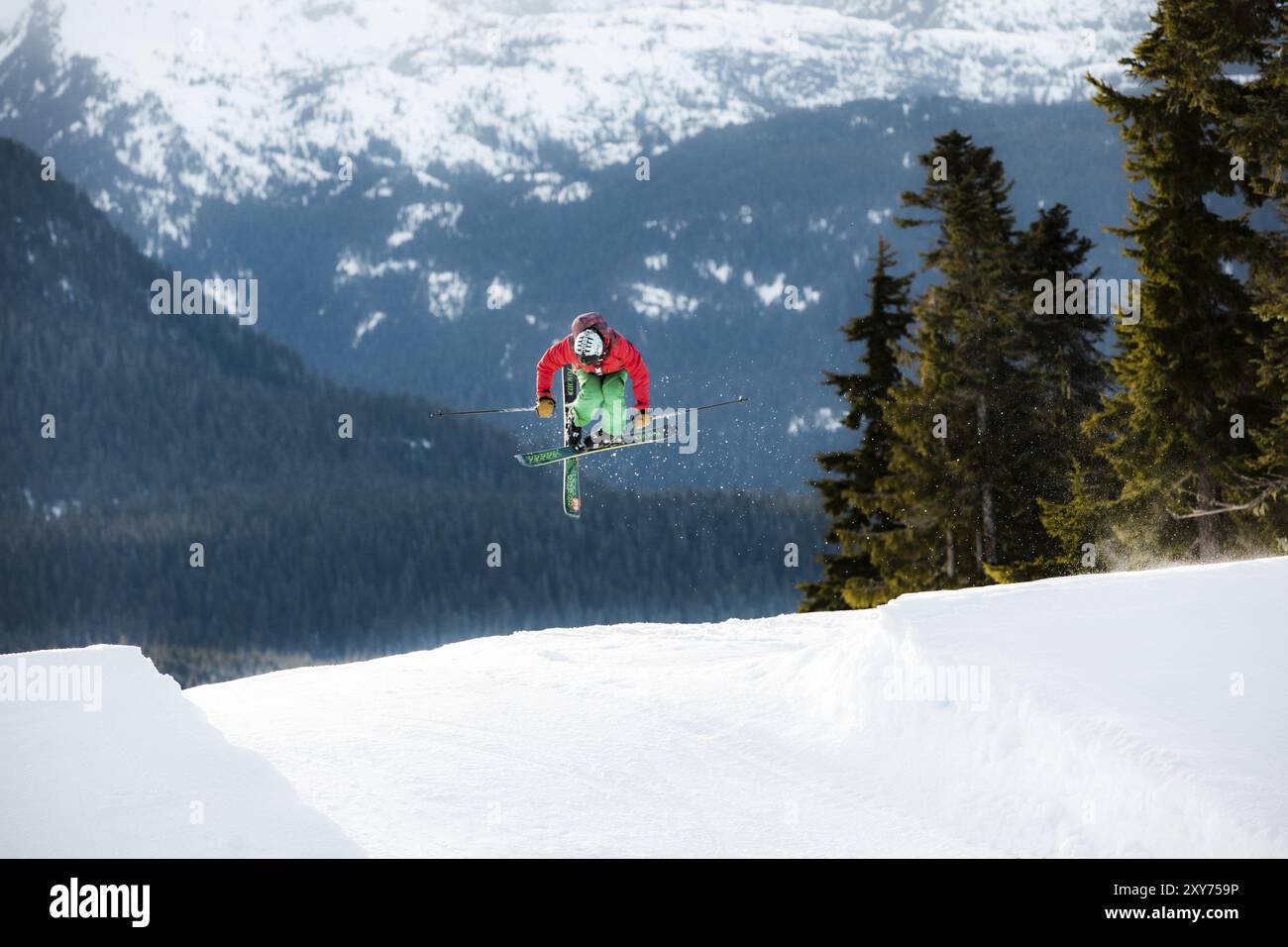 Skier in mid air on mountain slope hi-res stock photography and images ...