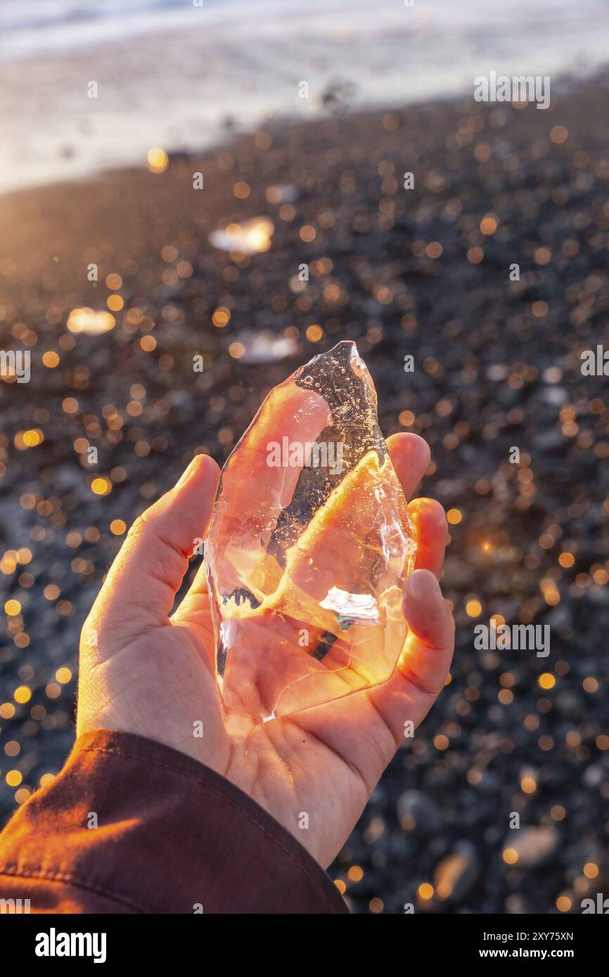 Piece ice in hand man hi-res stock photography and images - Alamy
