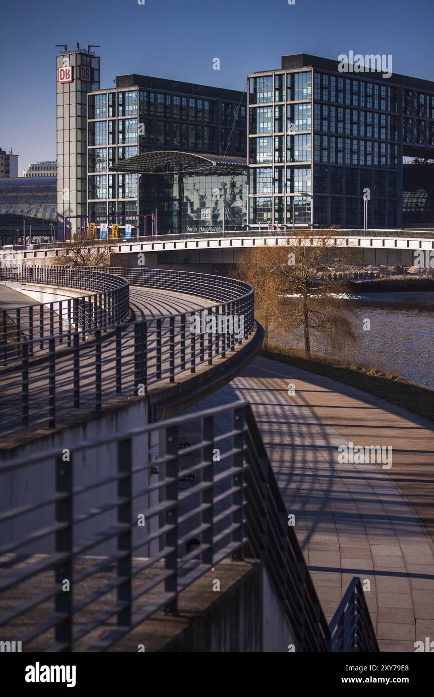 Central station building with glass towers and suspended glass roof ...