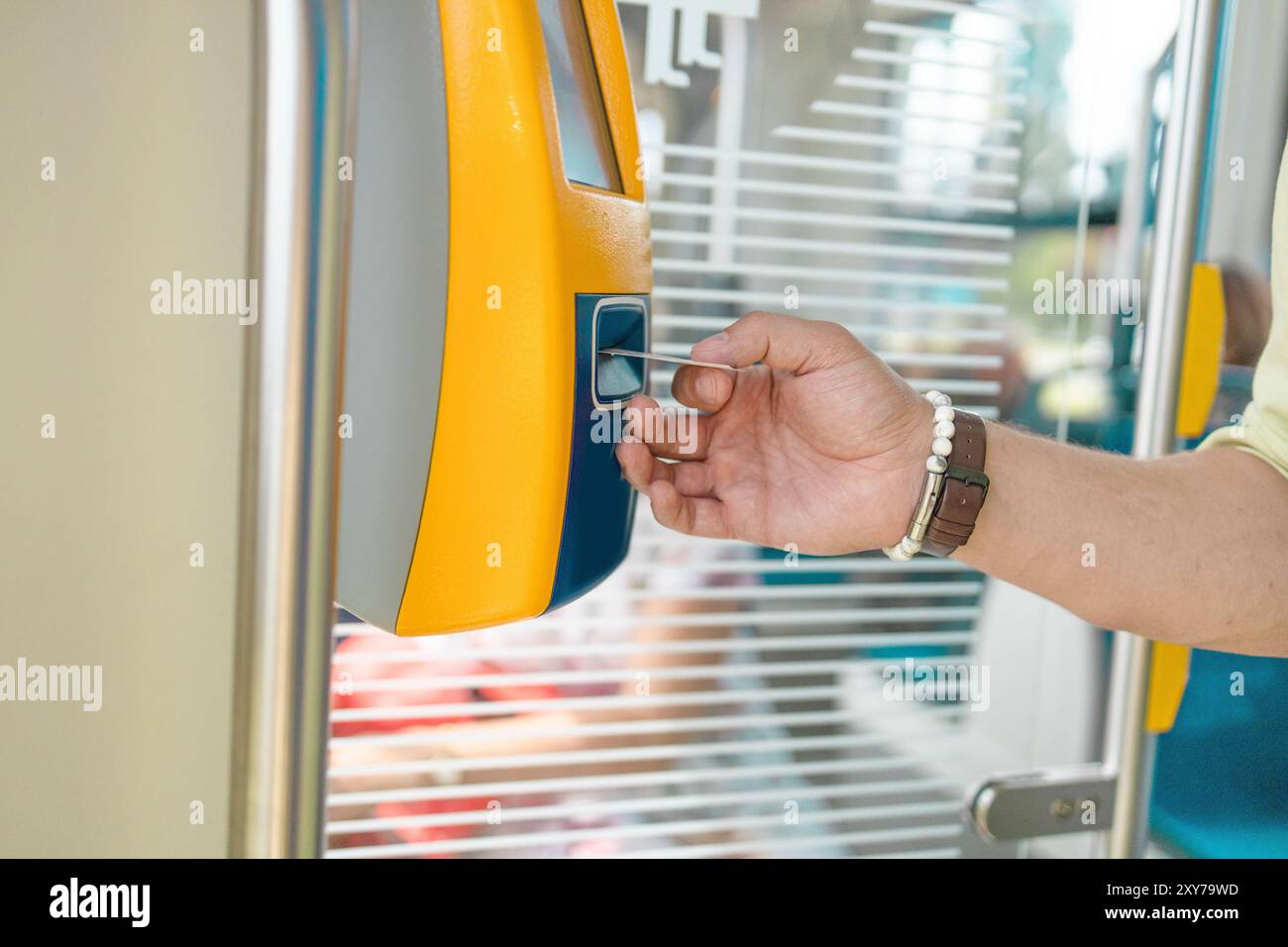 Easy payment for transportation. Man hand passenger taking ticket in ...