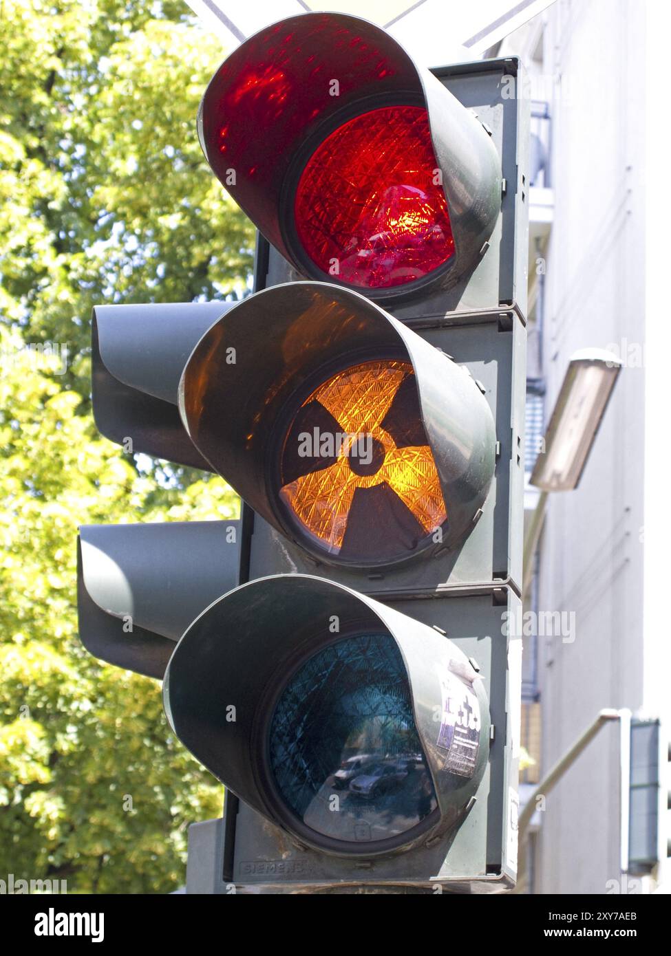 Orange traffic light with nuclear power sign in berlin, germany 2011 ...