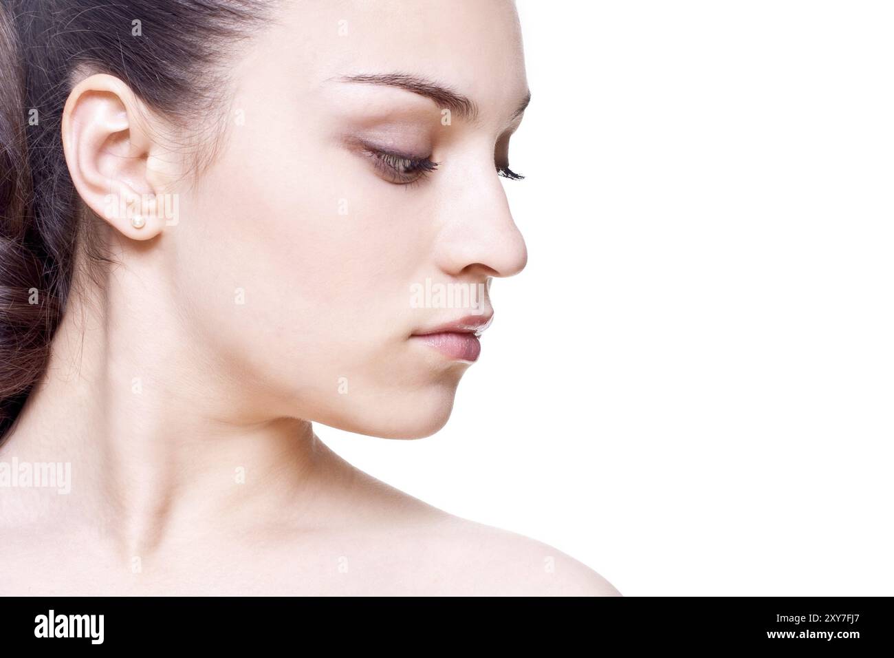 Beautiful woman face on a white background isolated Stock Photo - Alamy