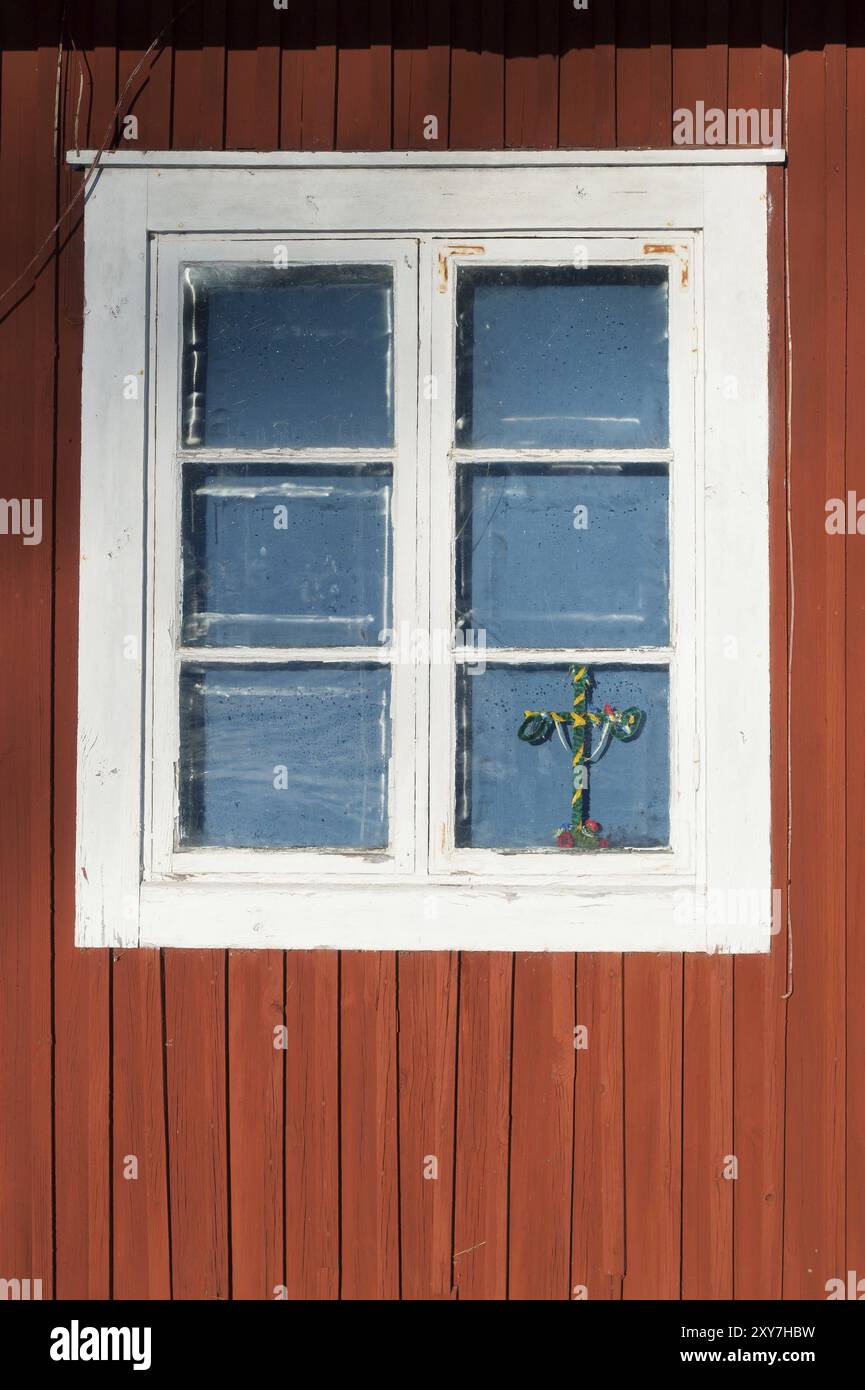 Window in an old swedish wooden house in Smaland, portrait format ...