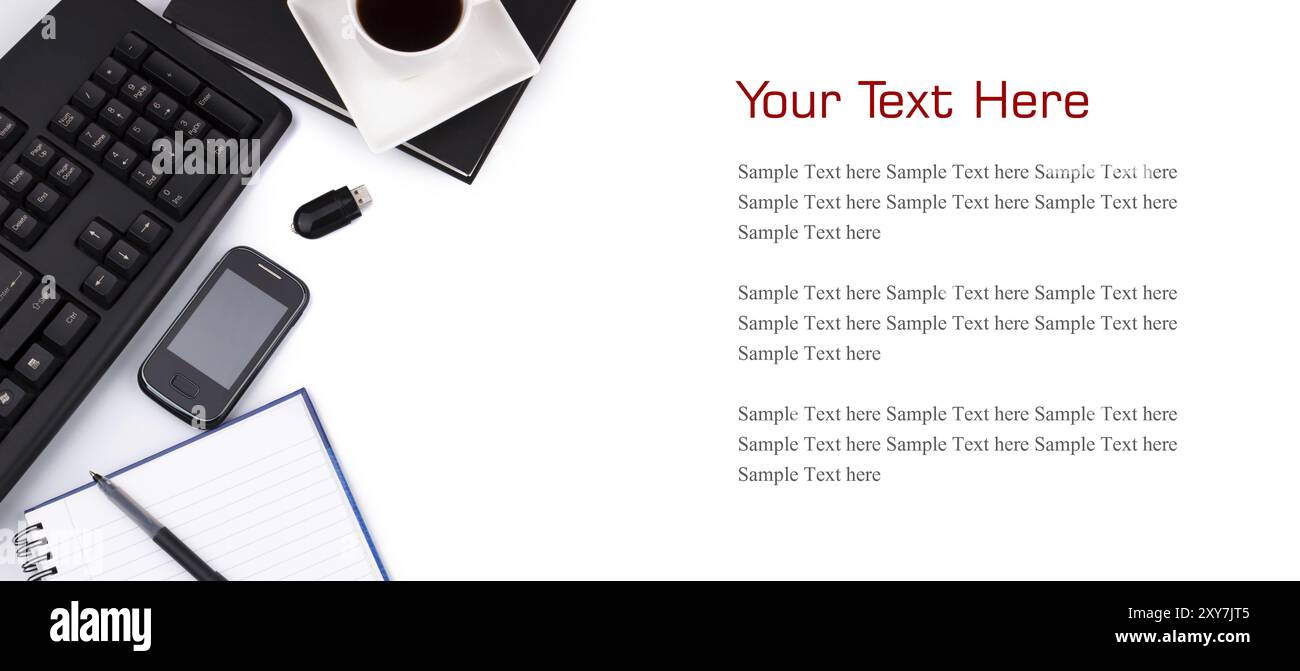 Overhead of office table with computer keyboard, mouse, smartphone, USB ...