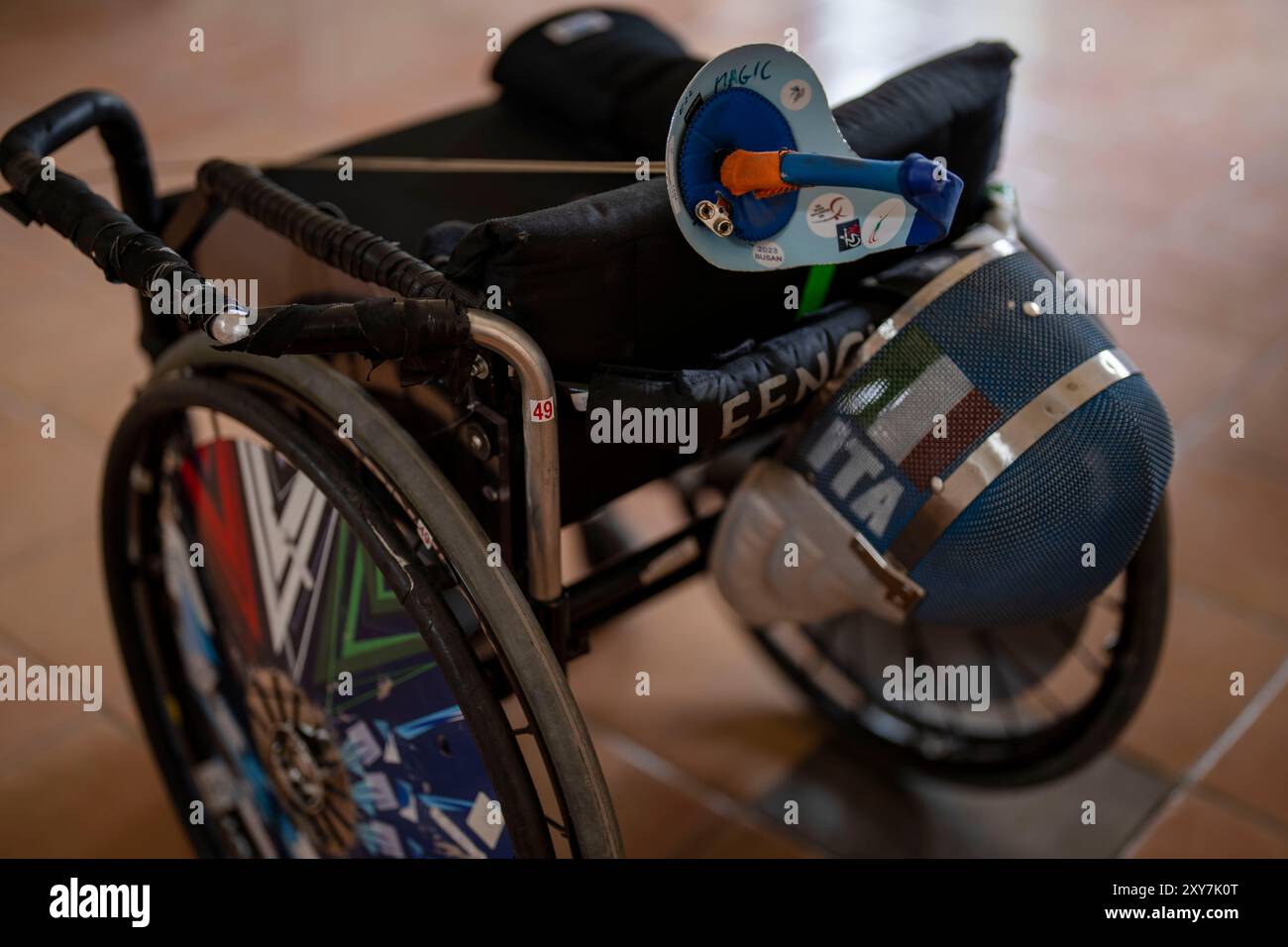 The saber and mask of Italian Paralympian fencer Edoardo Giordan rest ...
