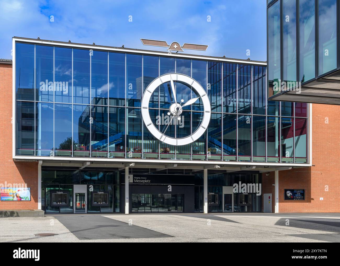 Entrance to building 2 of Messeplatz Basel showing the gigantic clock ...