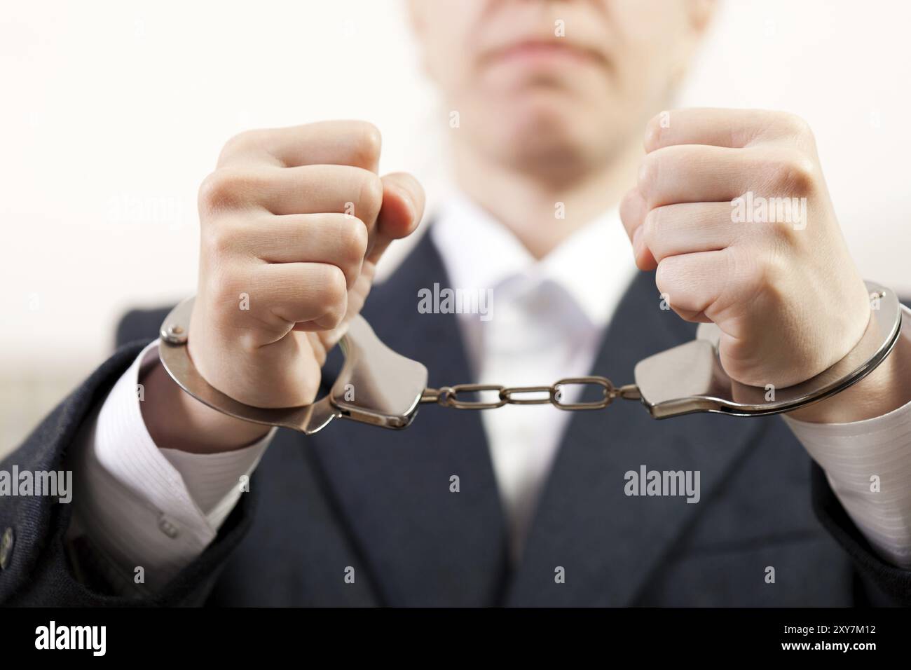 Police law steel handcuffs arrest crime human hand Stock Photo - Alamy