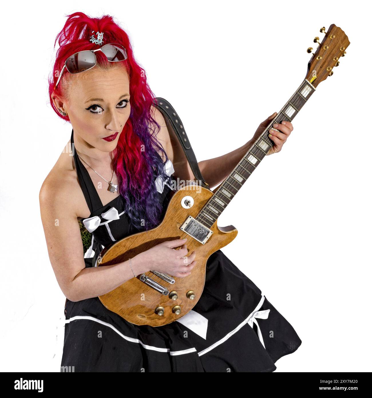 Rock'n'roll singer with red hair, guitar and microphone Stock Photo - Alamy