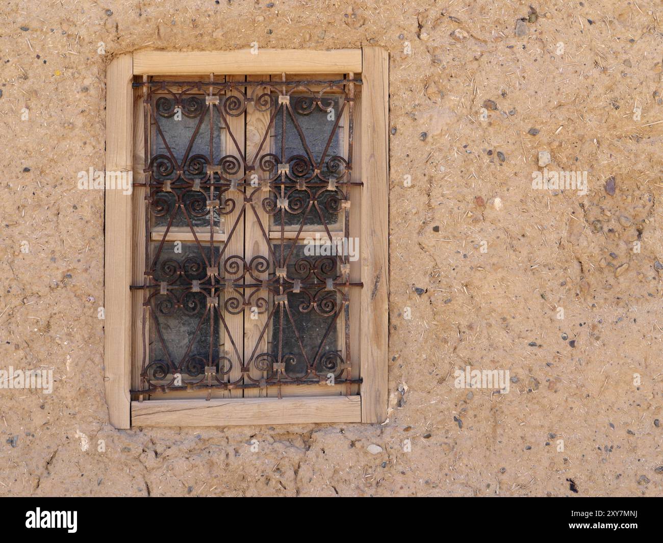 Window in a straw clay wall in Morocco Stock Photo - Alamy